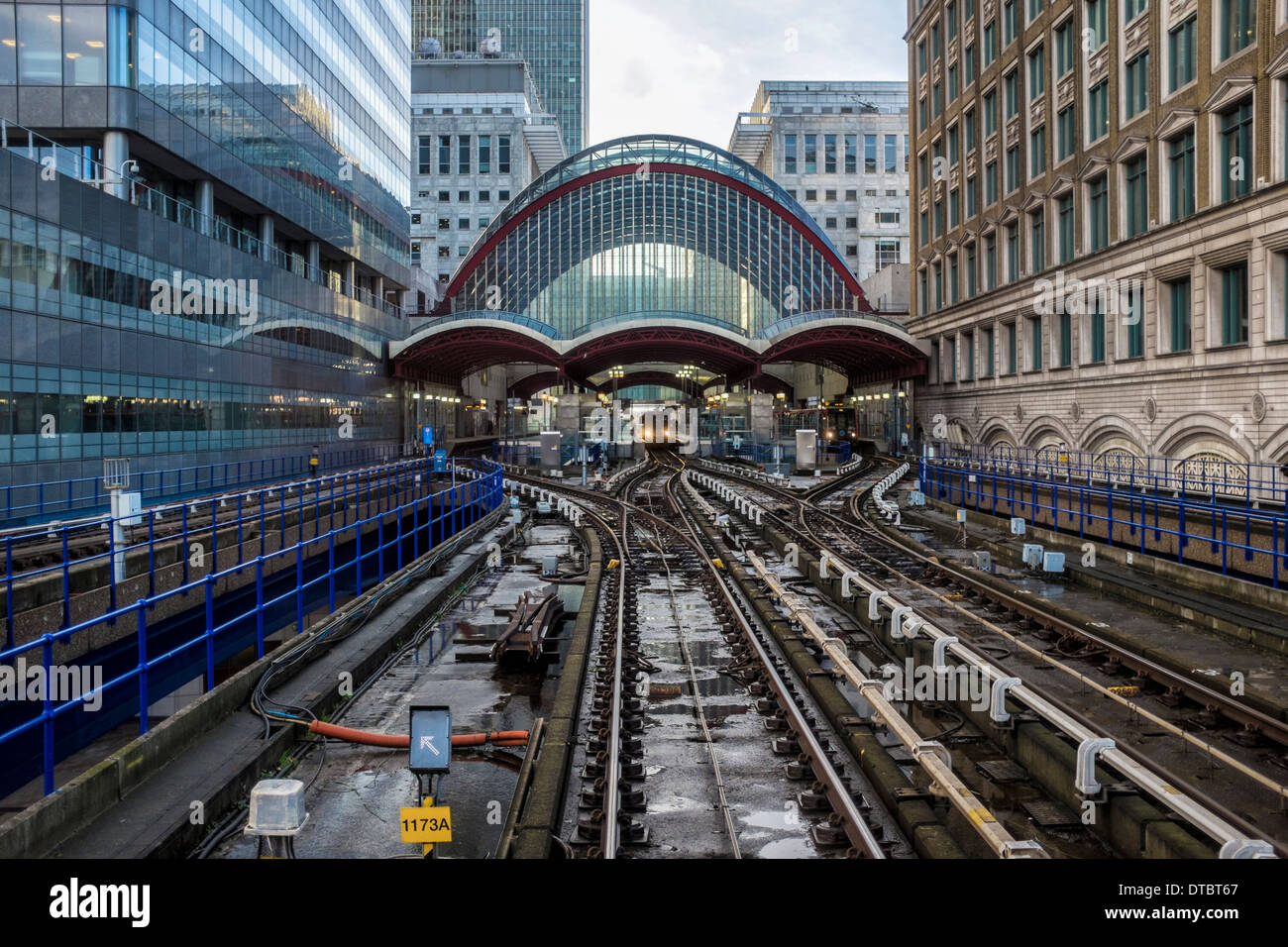 Canary Wharf DLR Docklands Light railway station, rail tracks, train ... Canary Wharf DLR Docklands Light railway station, rail tracks, train ...