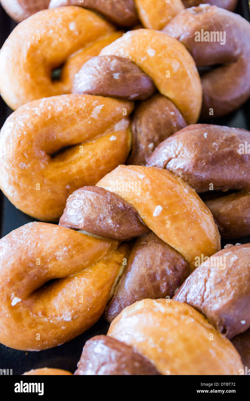Fresh two tone knot donuts from the local bakery shop Stock Photo - Alamy