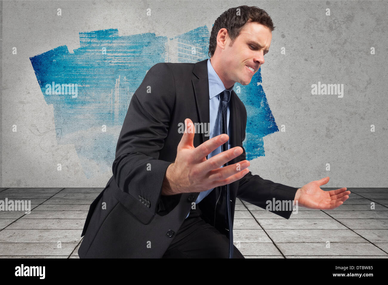 Composite image of businessman posing with arms out Stock Photo - Alamy
