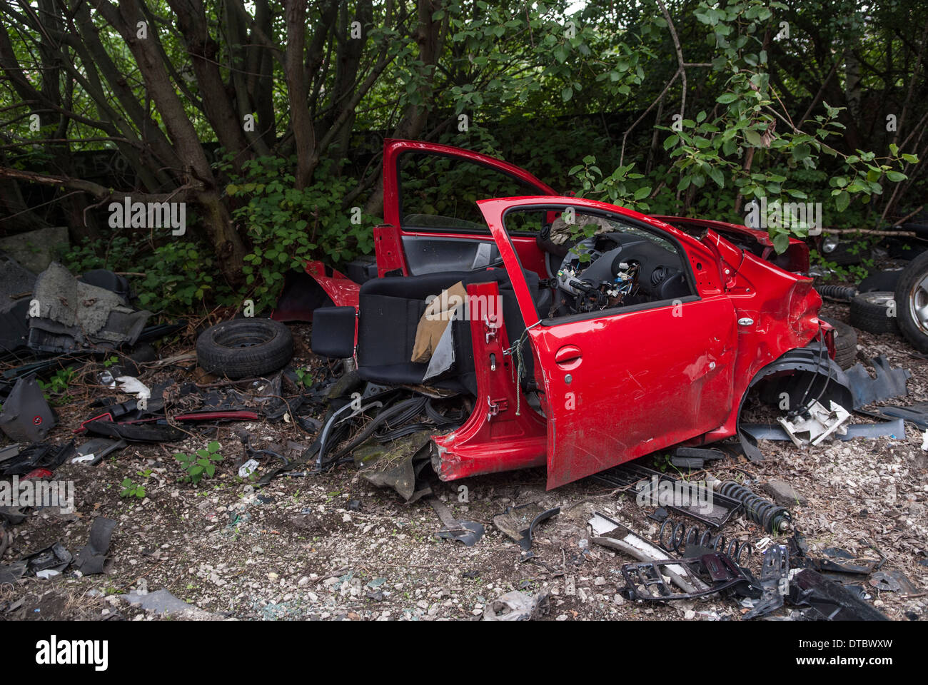 Crushed cars in scrap yard UK Stock Photo - Alamy