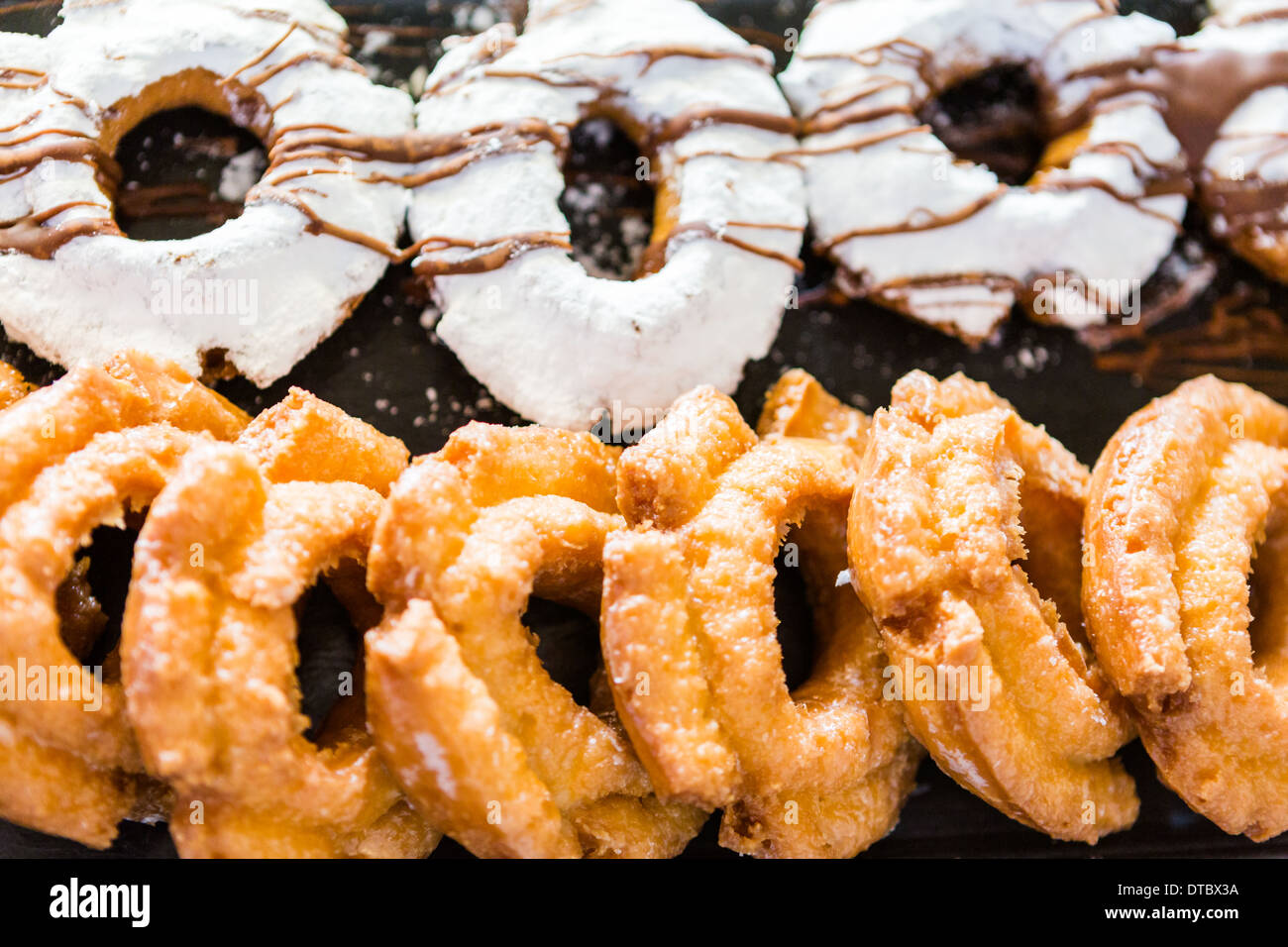 Row of fresh donuts from the local bakery shop Stock Photo - Alamy