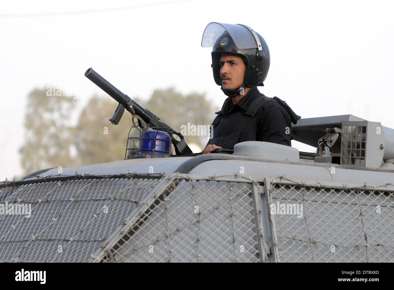 Cairo, Cairo, Egypt. 14th Feb, 2014. Egyptian security forces stand ...