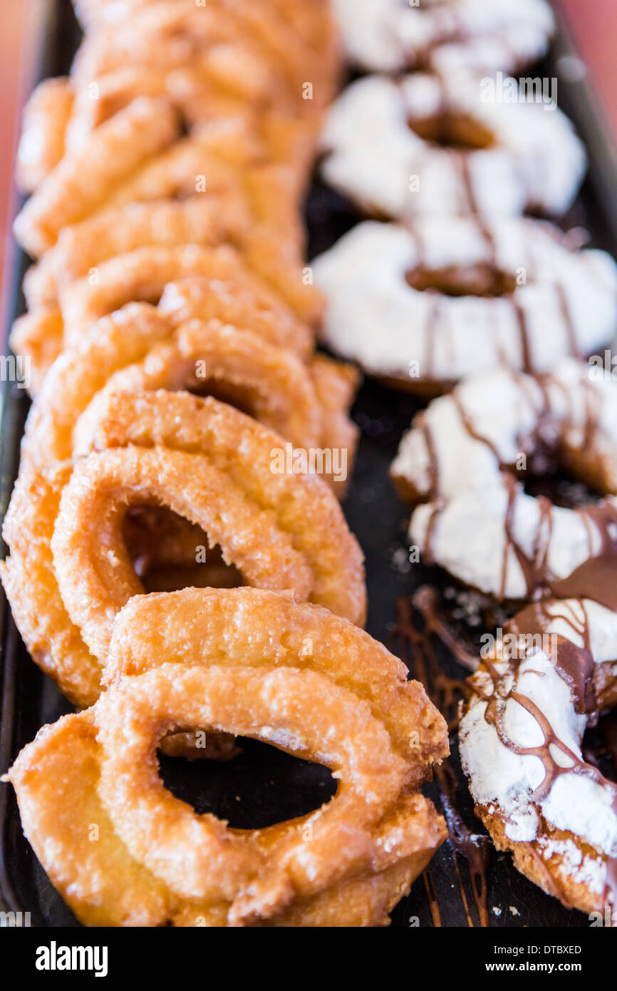 Row of fresh donuts from the local bakery shop Stock Photo - Alamy