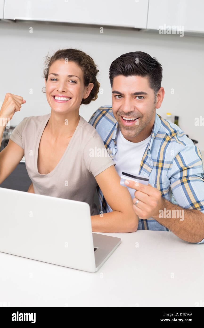 Couple excited laptop hi-res stock photography and images - Alamy
