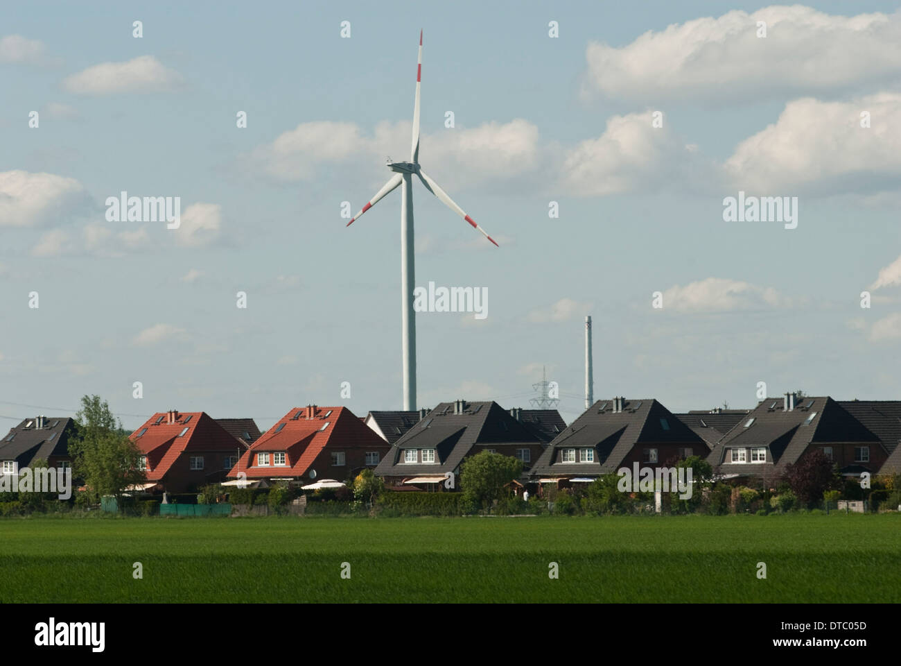 Wind turbine row house Stock Photo - Alamy