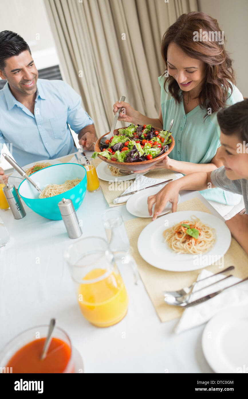 Family of three at the table hi-res stock photography and images - Alamy