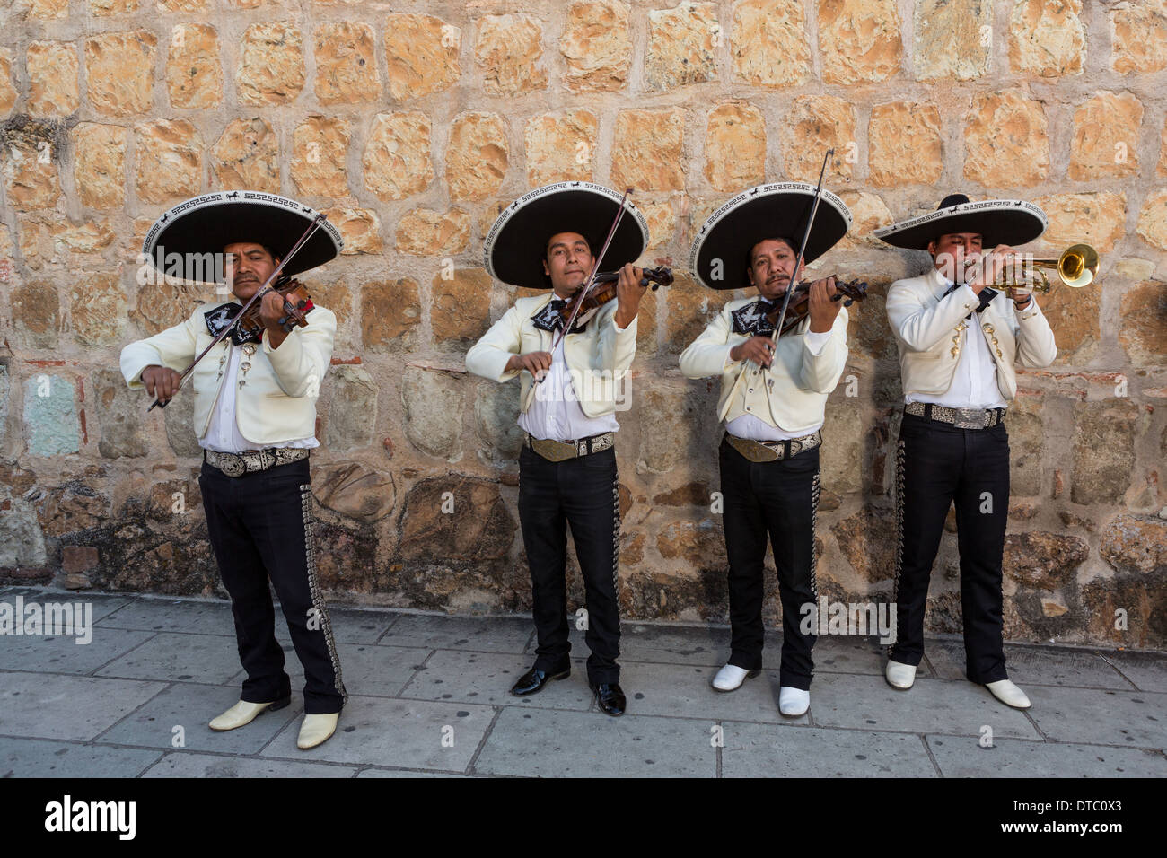 Musicians playing in mariachi band hi-res stock photography and images ...