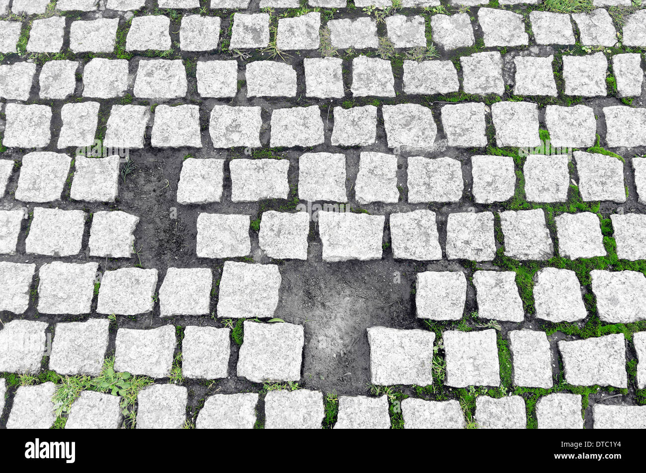paving stones broken with pothole on paviment Stock Photo - Alamy
