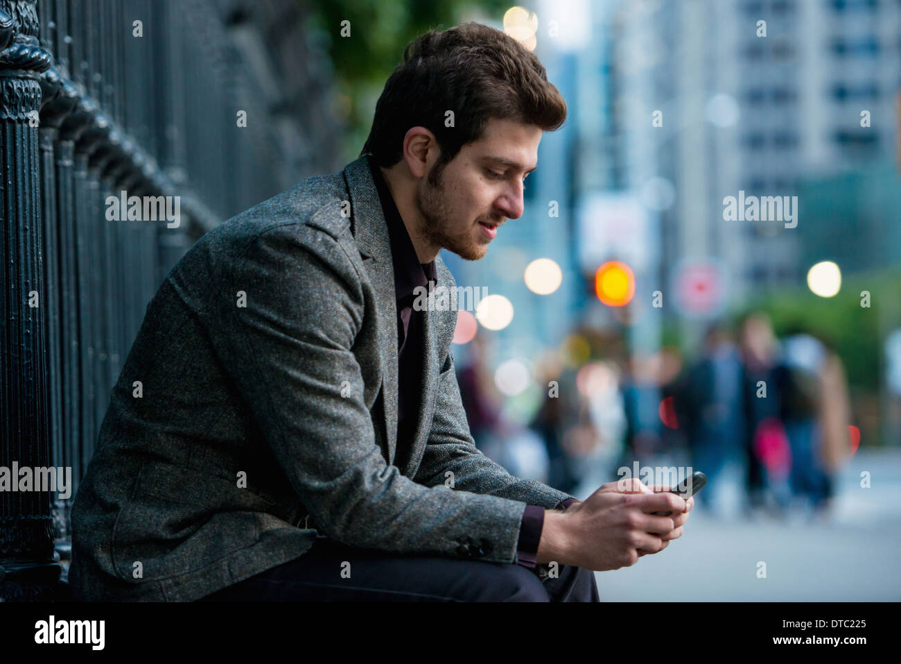 Young man waiting city street hi-res stock photography and images - Alamy