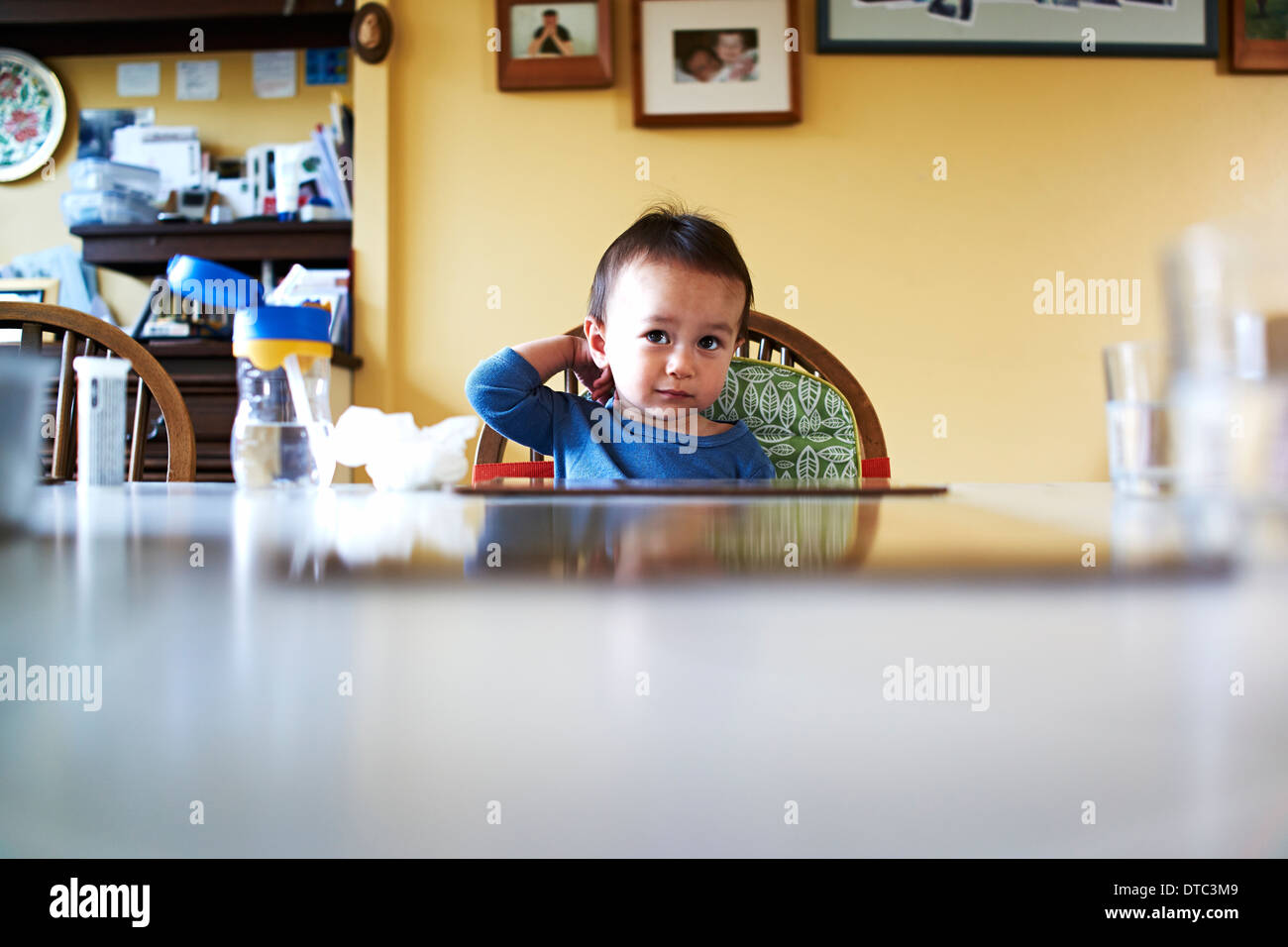Child sitting on kitchen surface hi-res stock photography and images ...