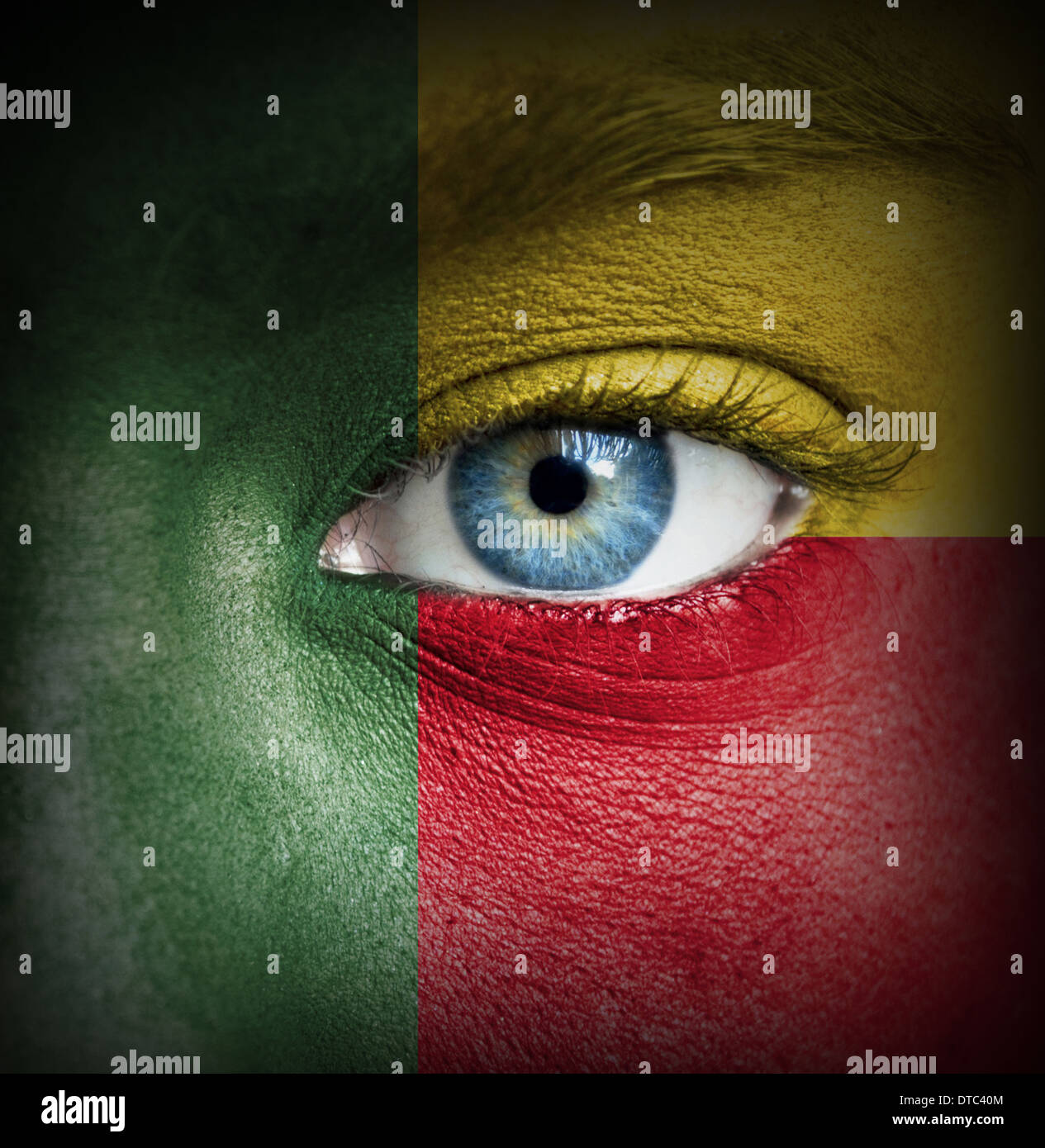 Human face painted with flag of Benin Stock Photo - Alamy