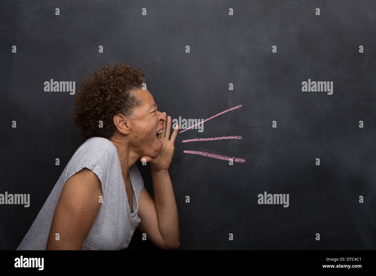 Senior woman shouting hi-res stock photography and images - Alamy