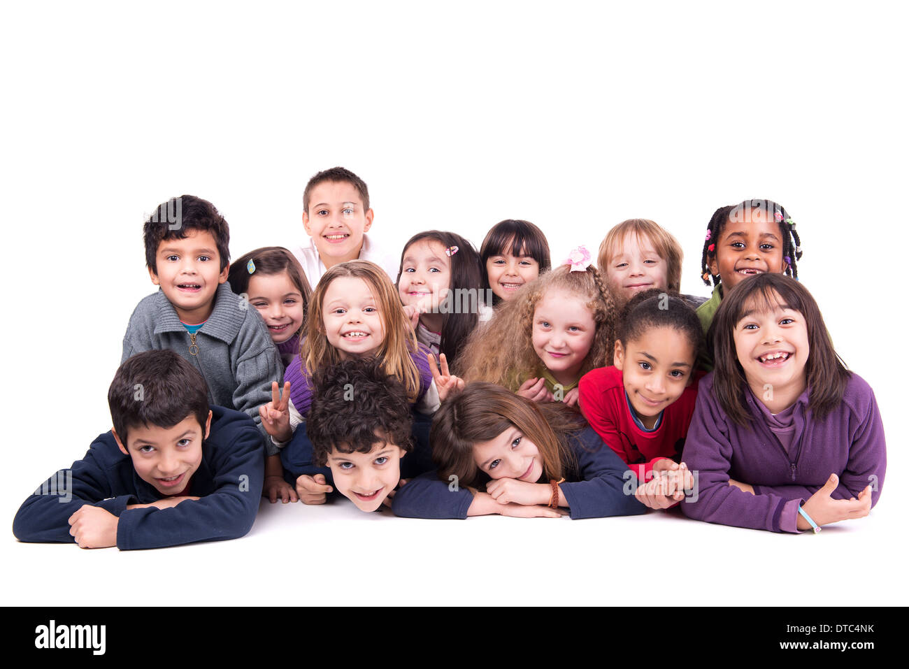 Group of children posing isolated in white Stock Photo - Alamy