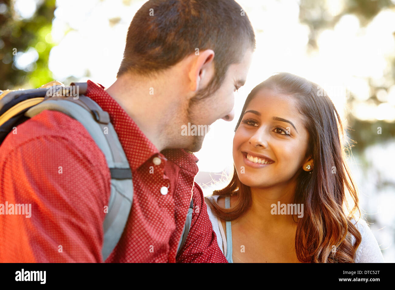 Young couple face-to-face Stock Photo - Alamy