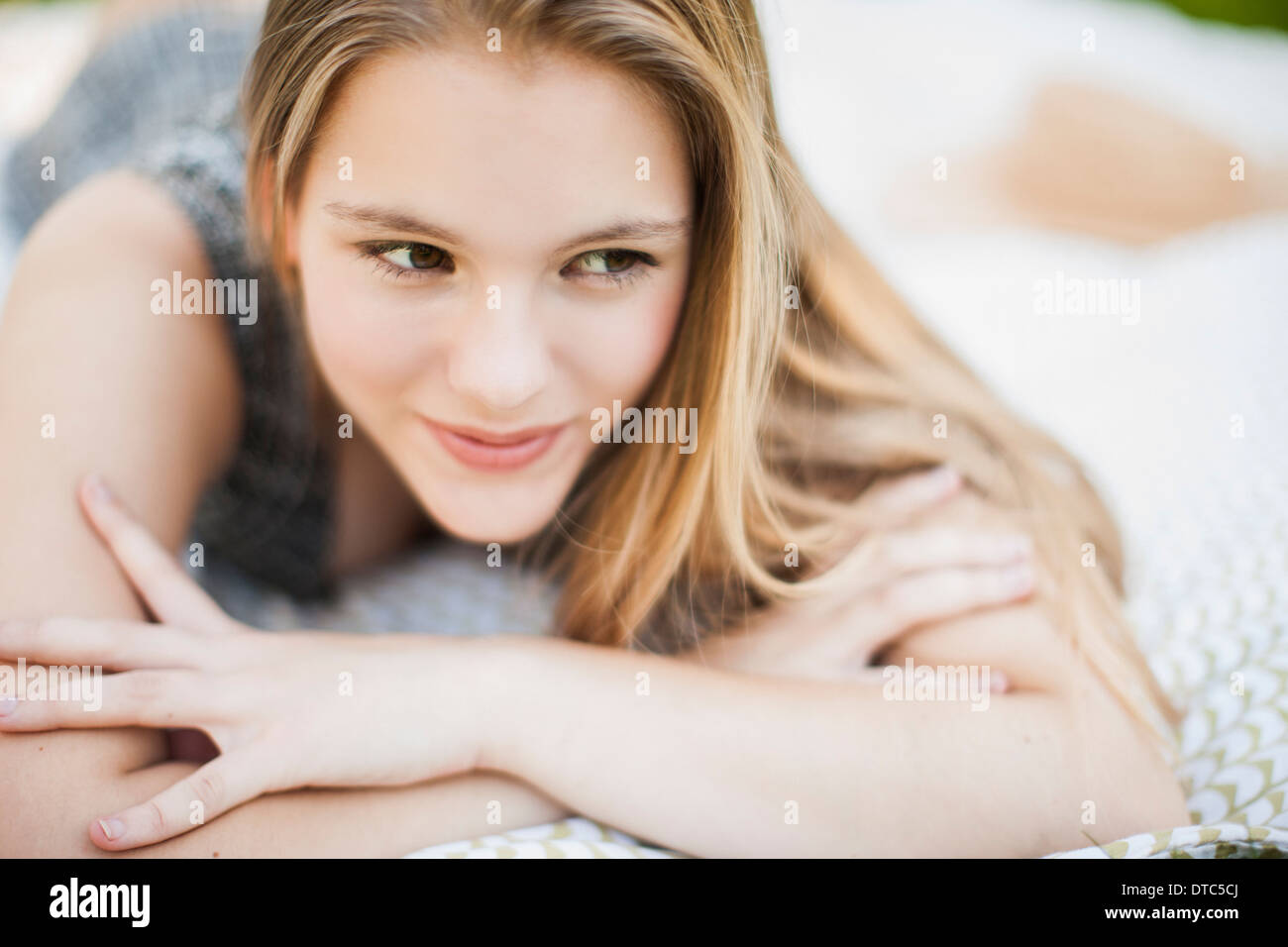 Girl lying on the blanket hi-res stock photography and images - Alamy