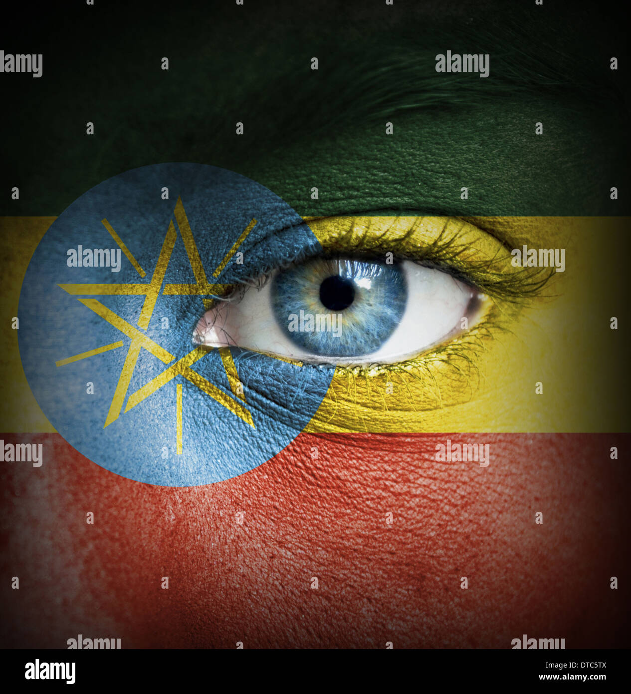 Human face painted with flag of Ethiopia Stock Photo - Alamy