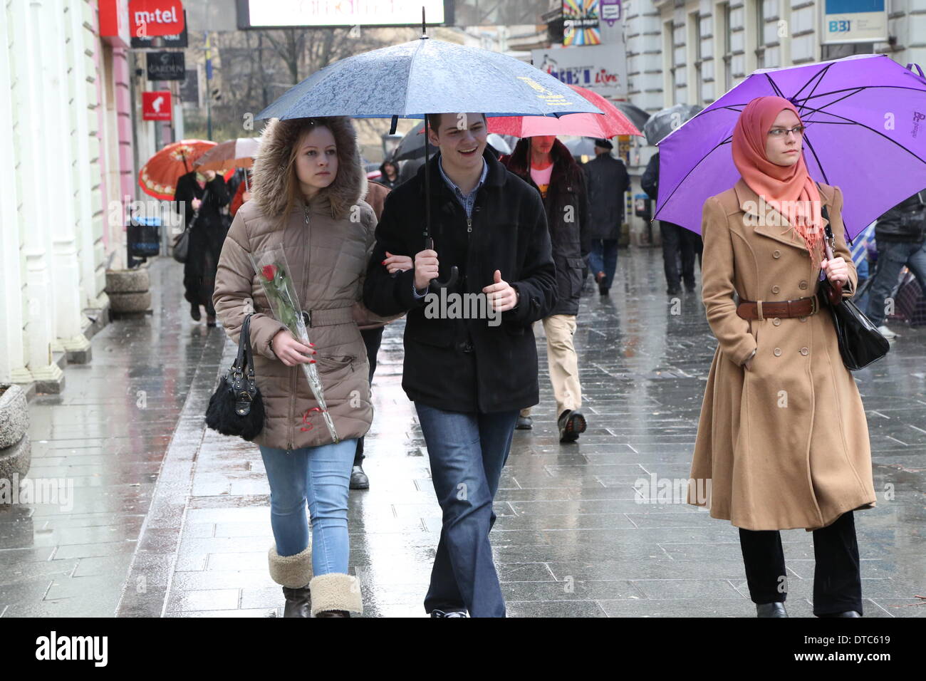 Sarajevo, Bosnia and Herzegovina. 14th Feb, 2014. A couple walks in ...