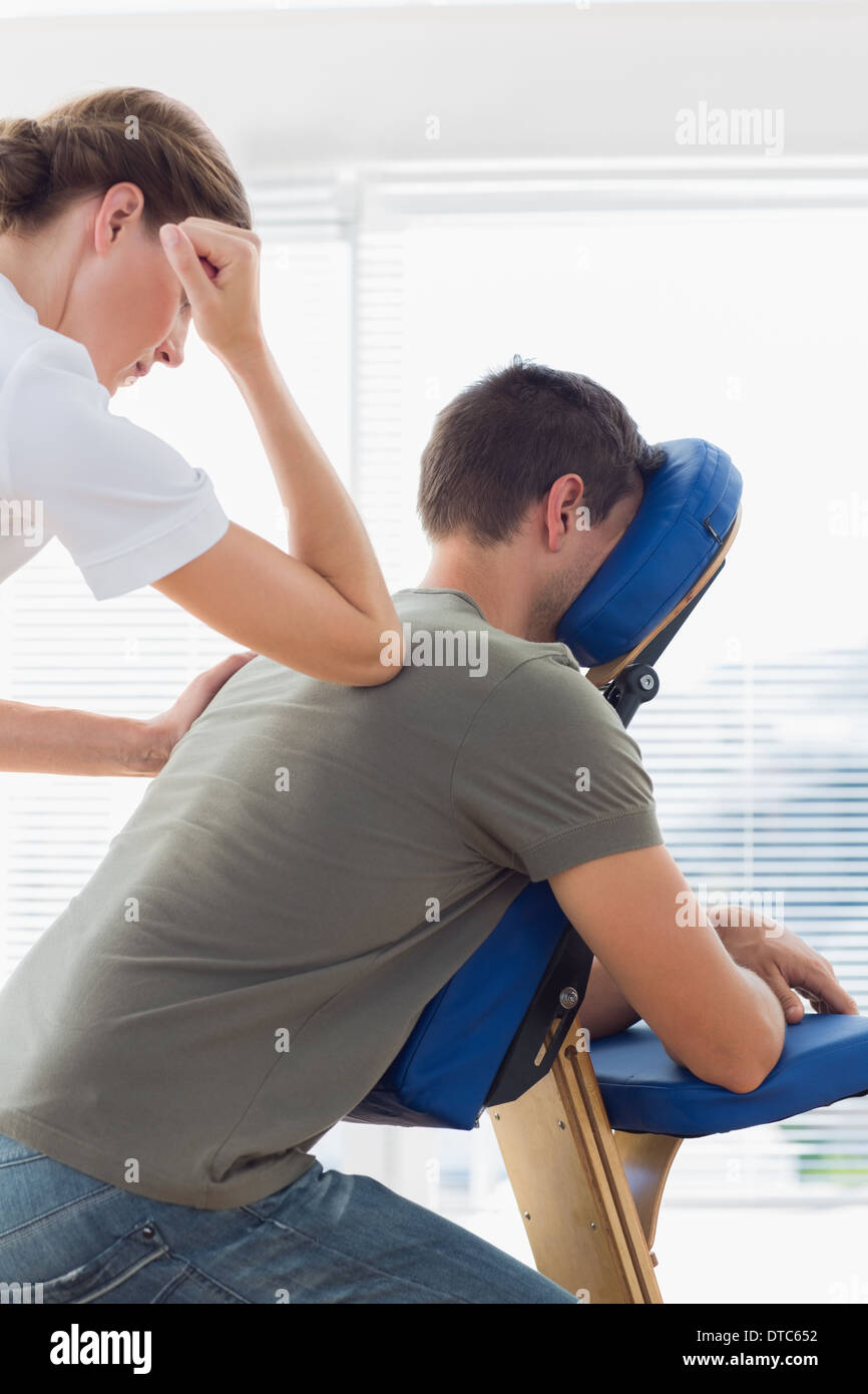 Man receiving massage from therapist Stock Photo - Alamy