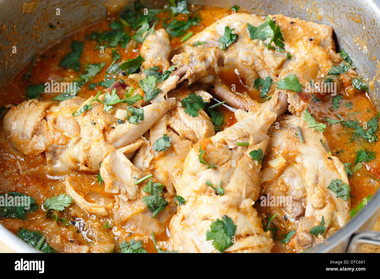 Basic balti chicken, freshly prepared and ready to serve, in a saucepan ...