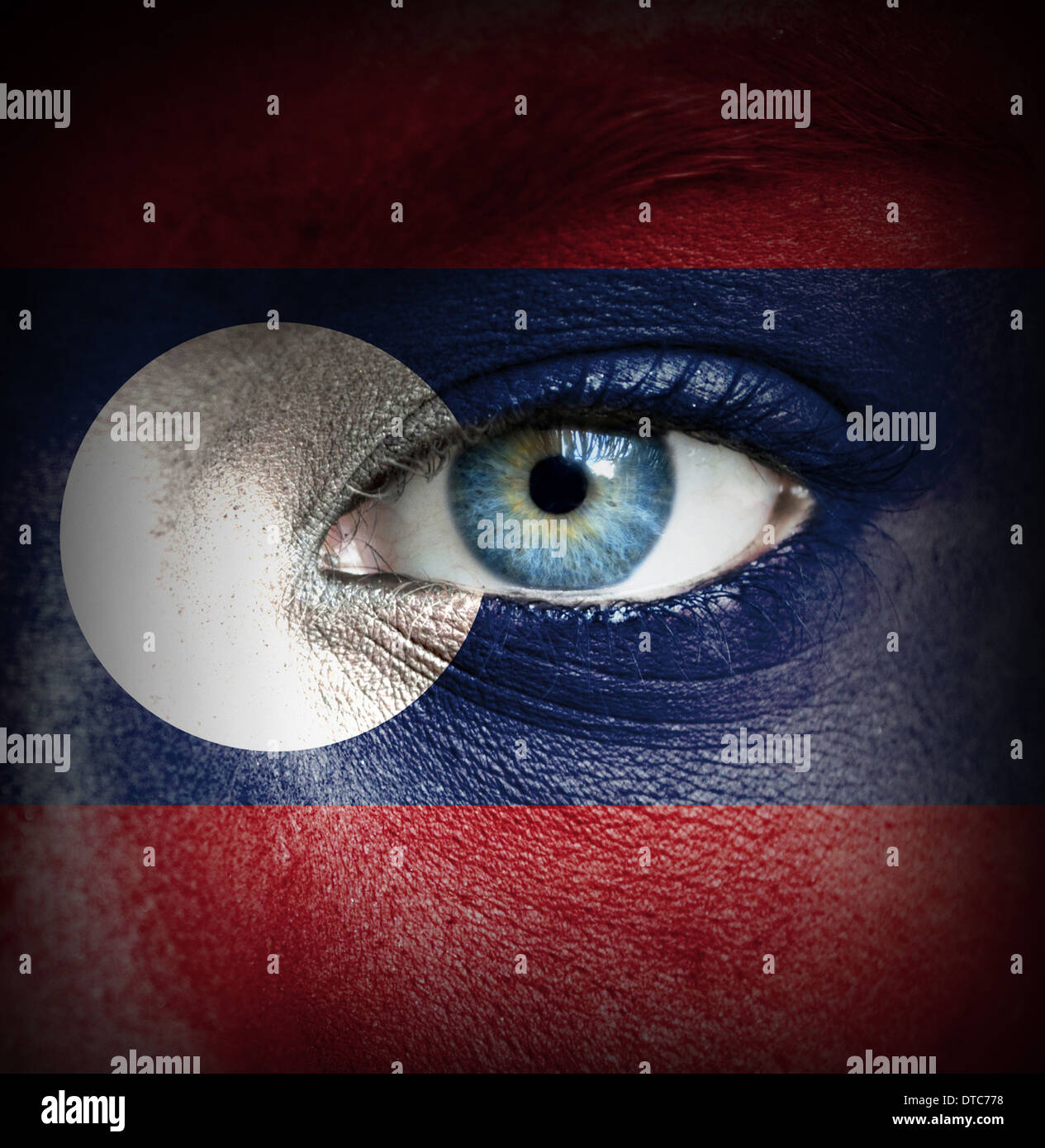 Human face painted with flag of Laos Stock Photo - Alamy