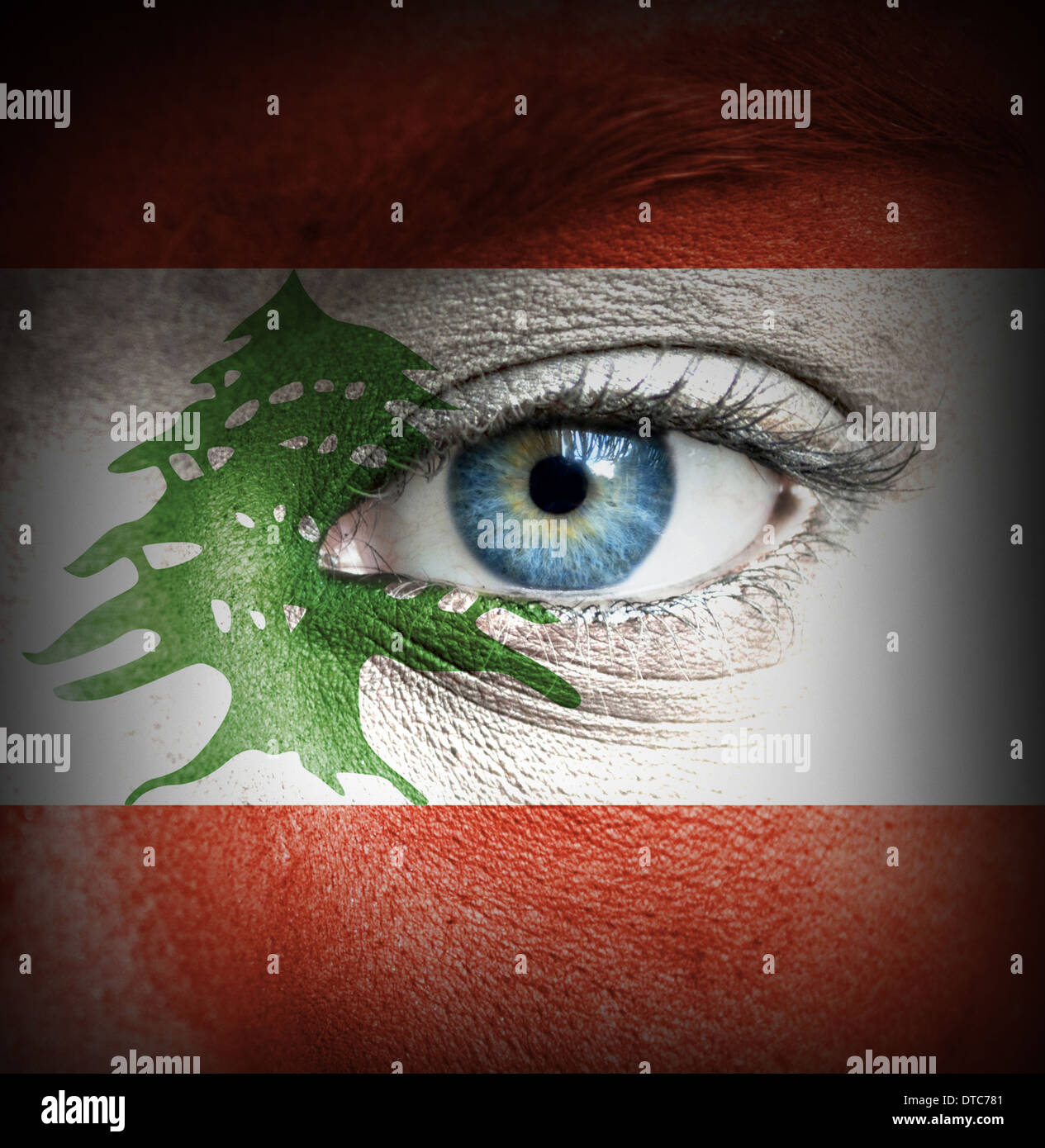 Human face painted with flag of Lebanon Stock Photo - Alamy