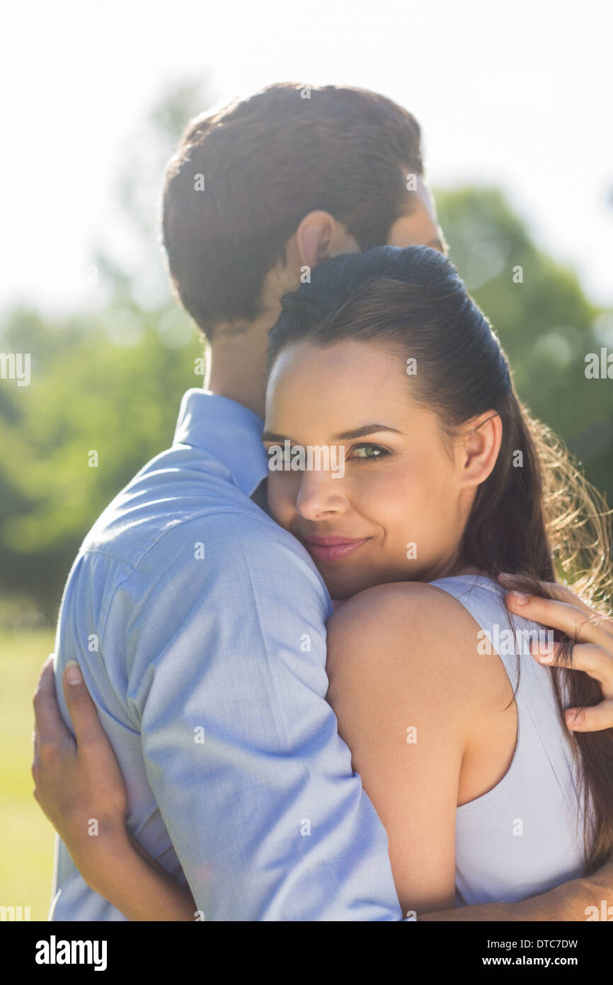 Side view attractive couple hugging hi-res stock photography and images ...