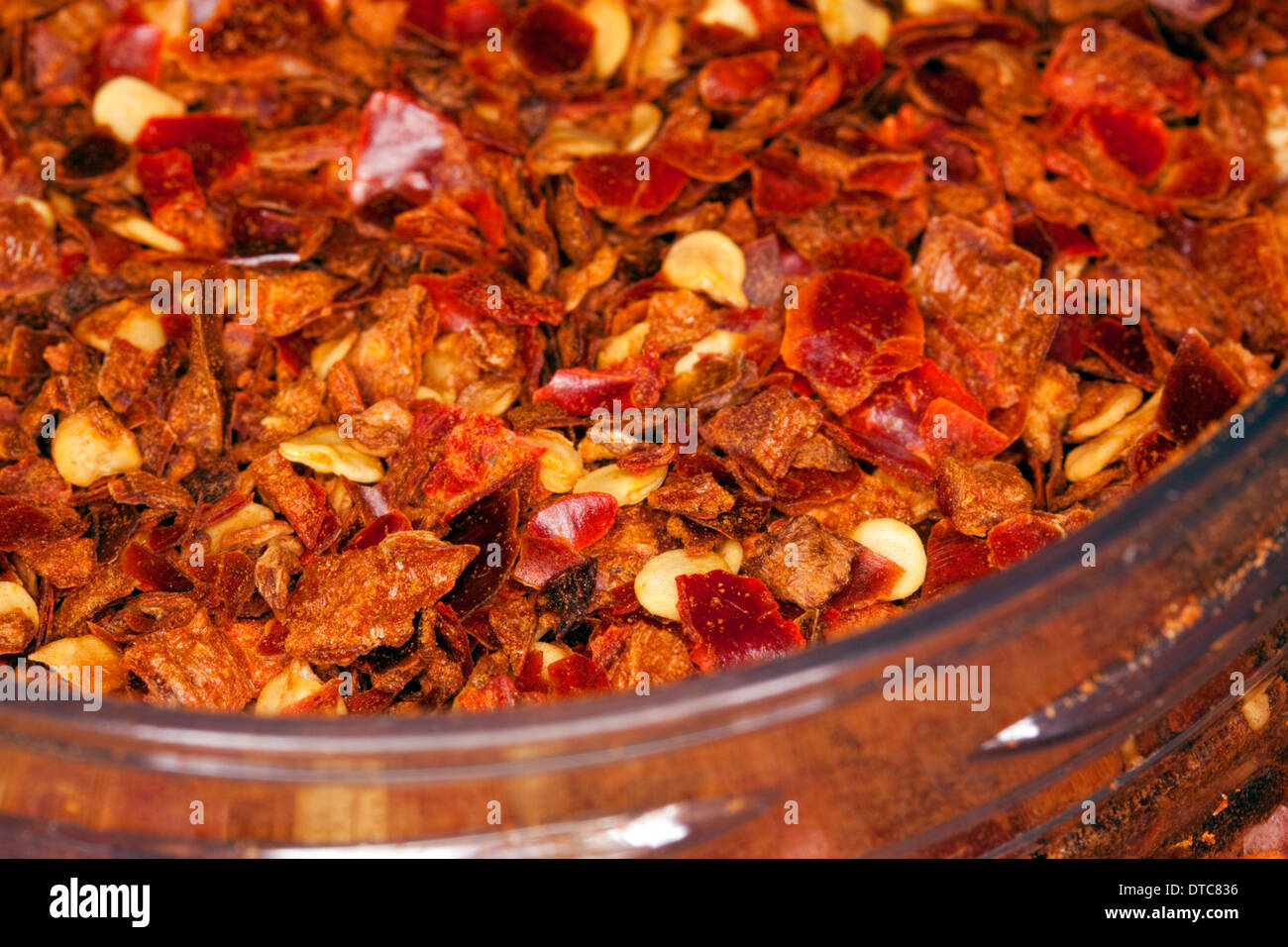Chilli flakes in a jar Stock Photo - Alamy