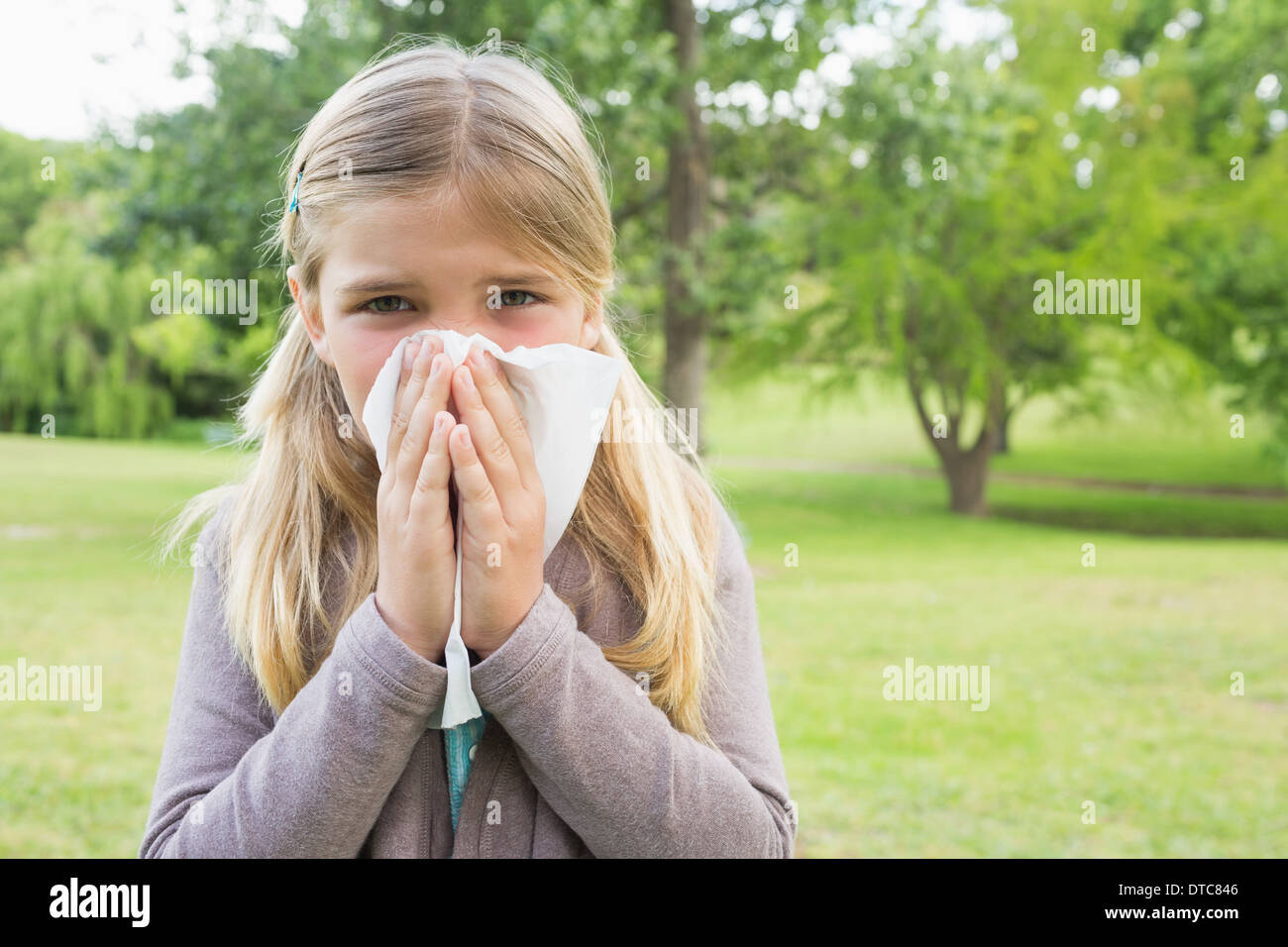 Girl blowing nose tissue paper hi-res stock photography and images - Alamy