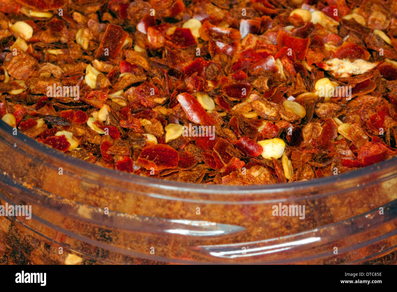 Chilli flakes in a jar Stock Photo - Alamy