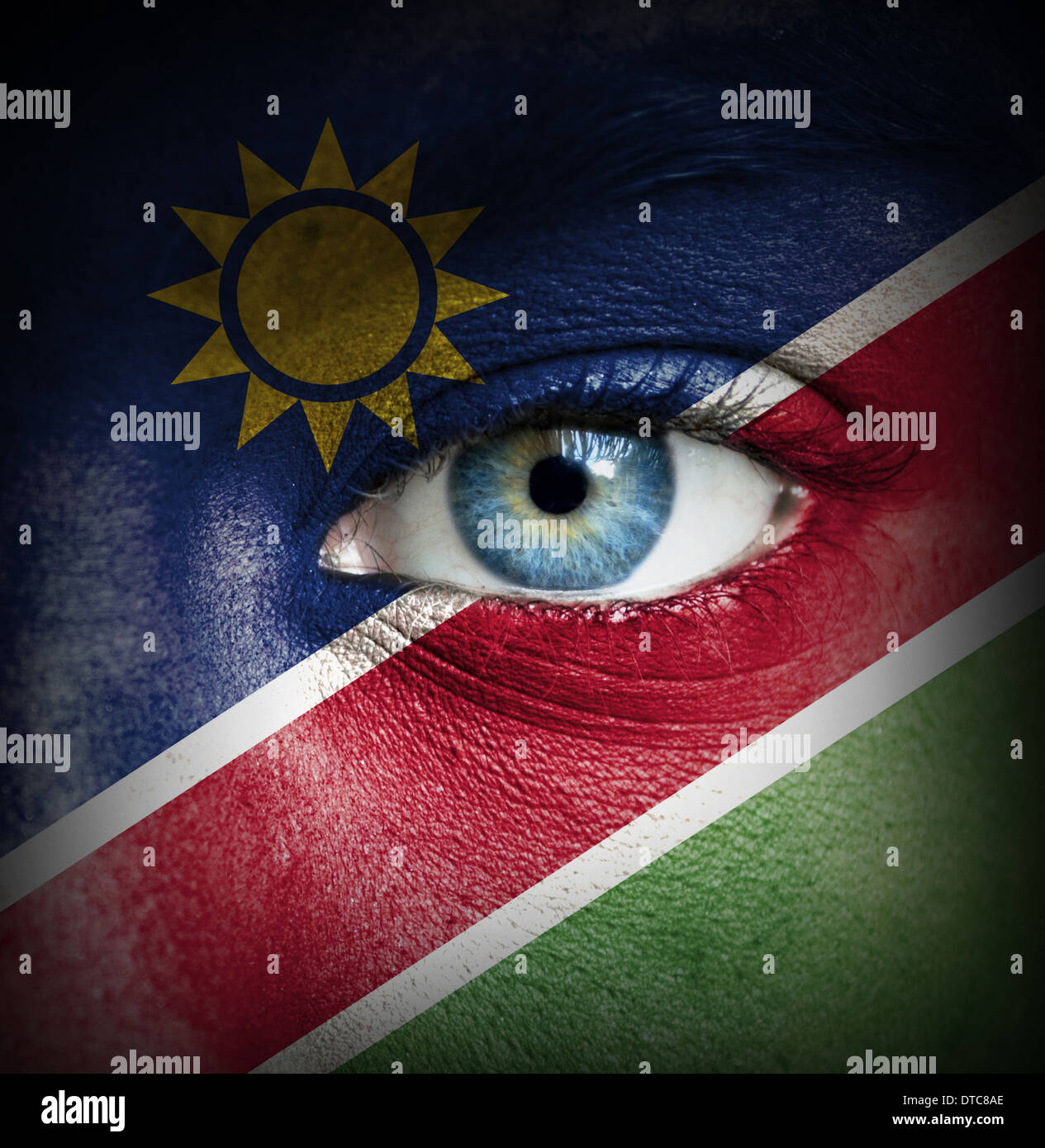 Human face painted with flag of Namibia Stock Photo - Alamy
