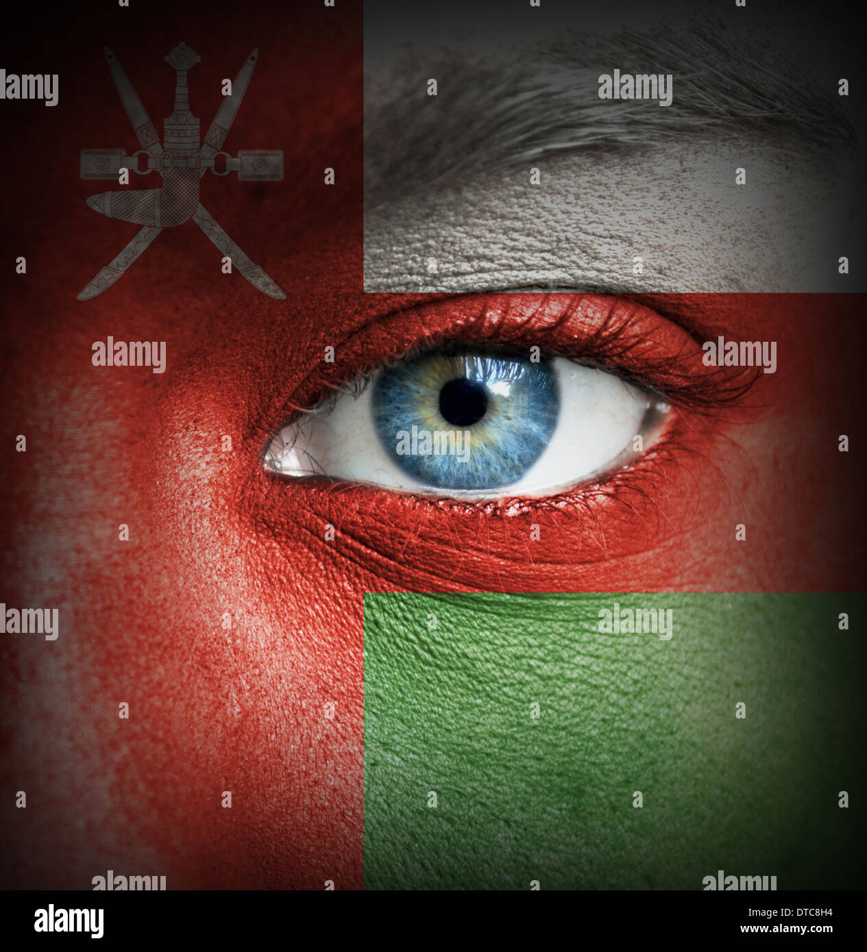 Human face painted with flag of Oman Stock Photo - Alamy