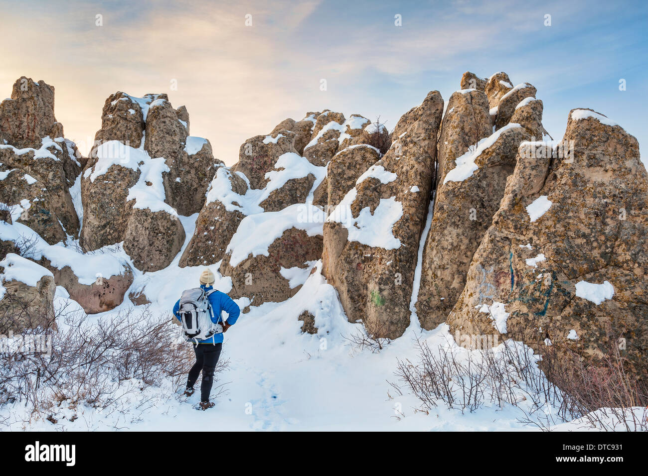 a hiker in Natural Fort sculpted from sandstone (Oligocenne White River ...