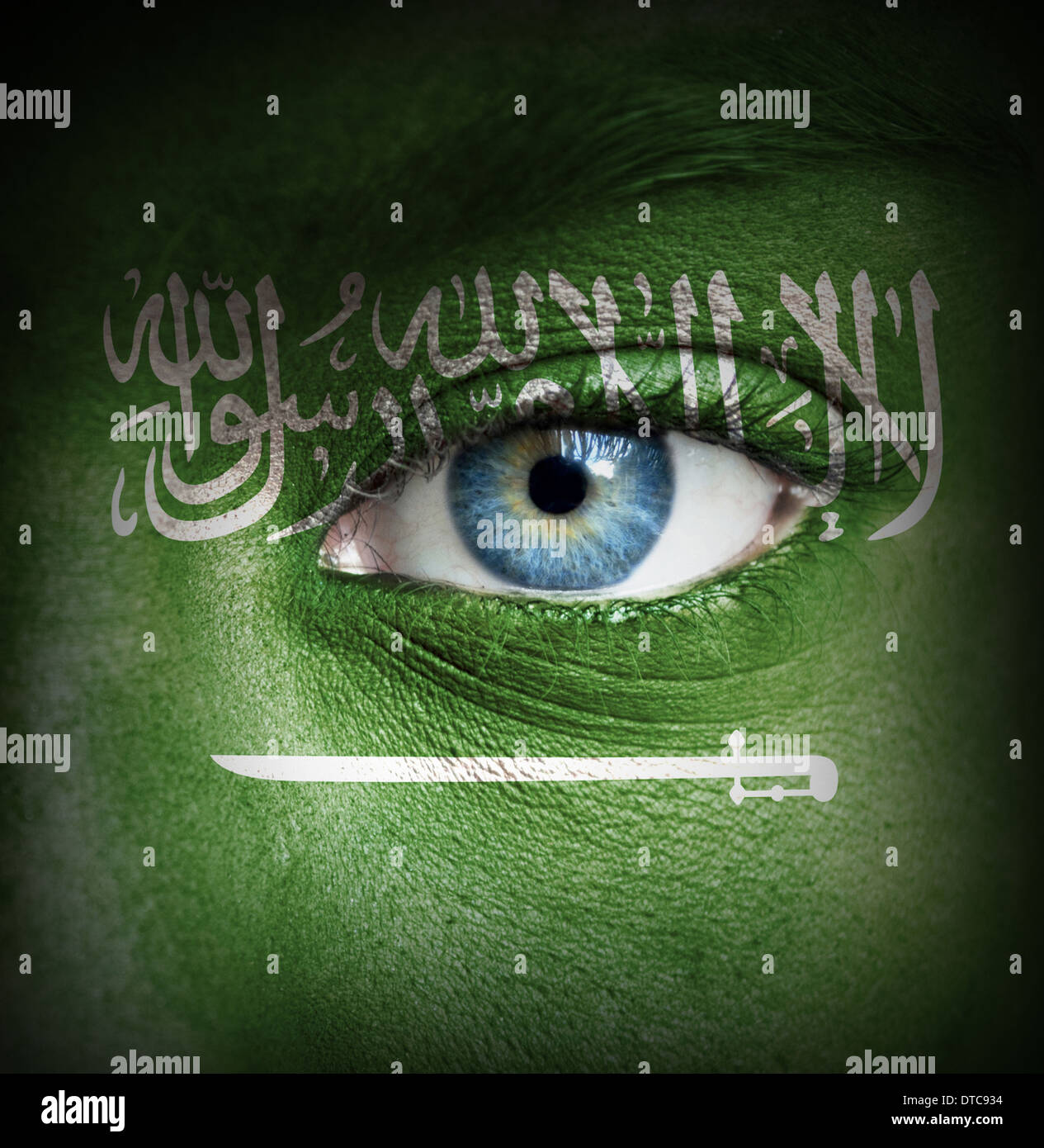 Human face painted with flag of Saudi Arabia Stock Photo - Alamy