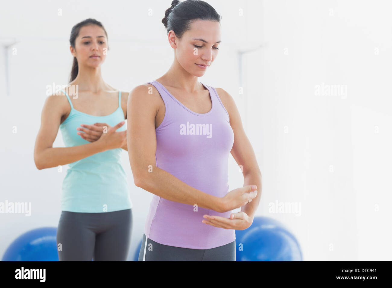 Beautiful sporty women exercises hi-res stock photography and images ...