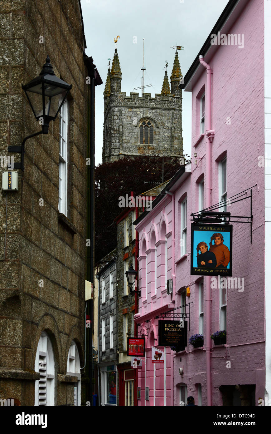 St Finbarr church tower and King of Prussia pub in central Fowey ...