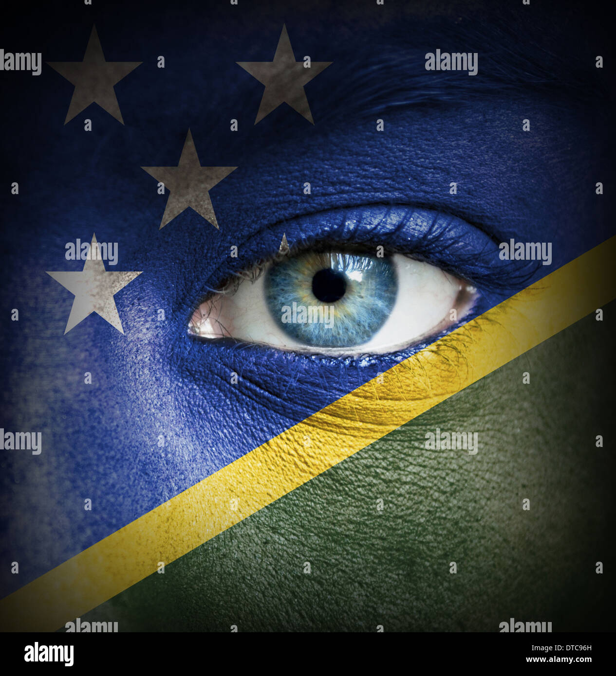 Human face painted with flag of Solomon Islands Stock Photo - Alamy