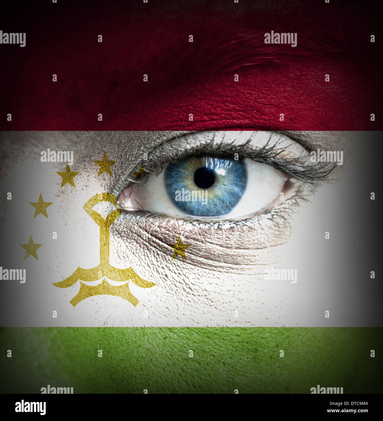 Human face painted with flag of Tajikistan Stock Photo - Alamy