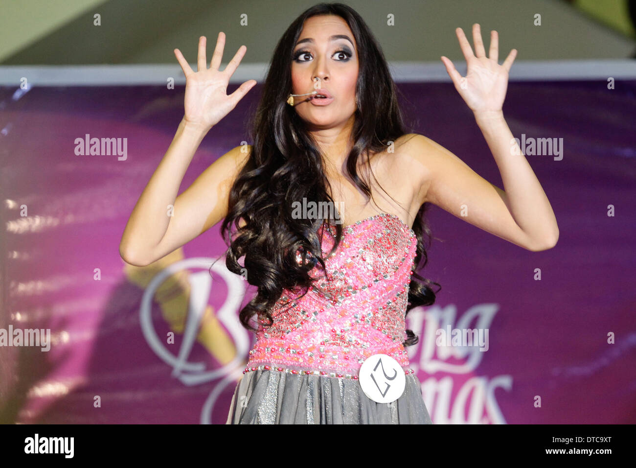 Quezon City, Philippines - A beaty pageant candidate performs a song ...