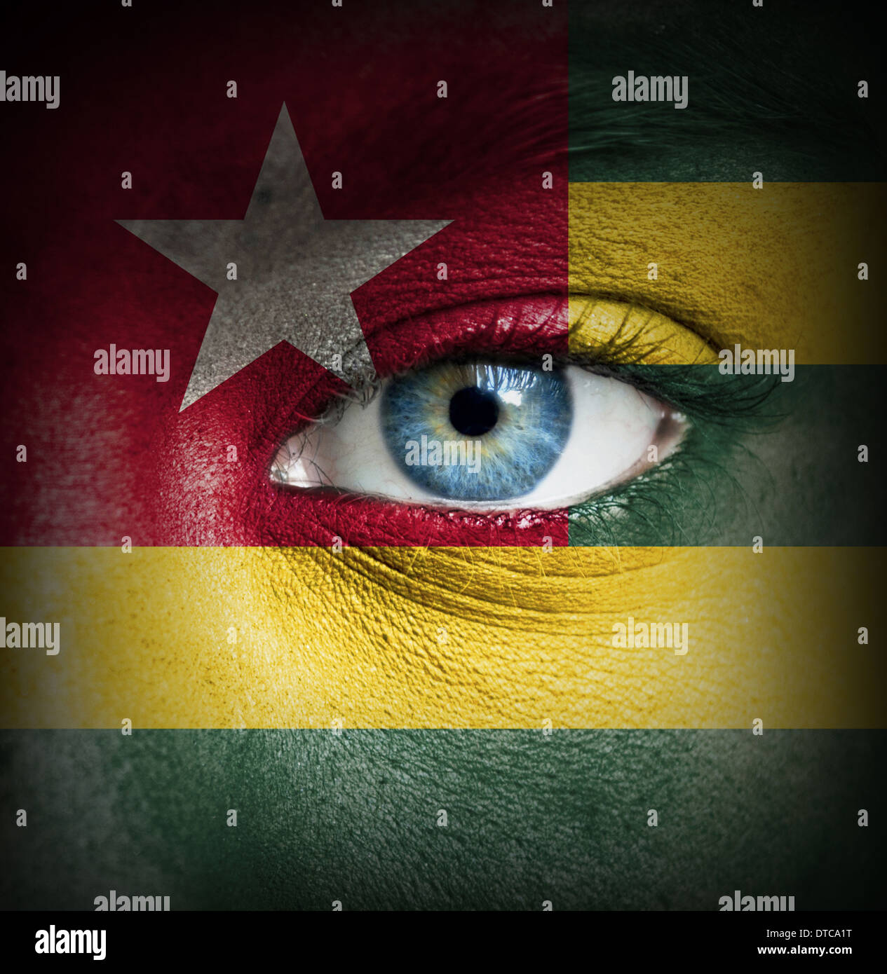 Human face painted with flag of Togo Stock Photo - Alamy