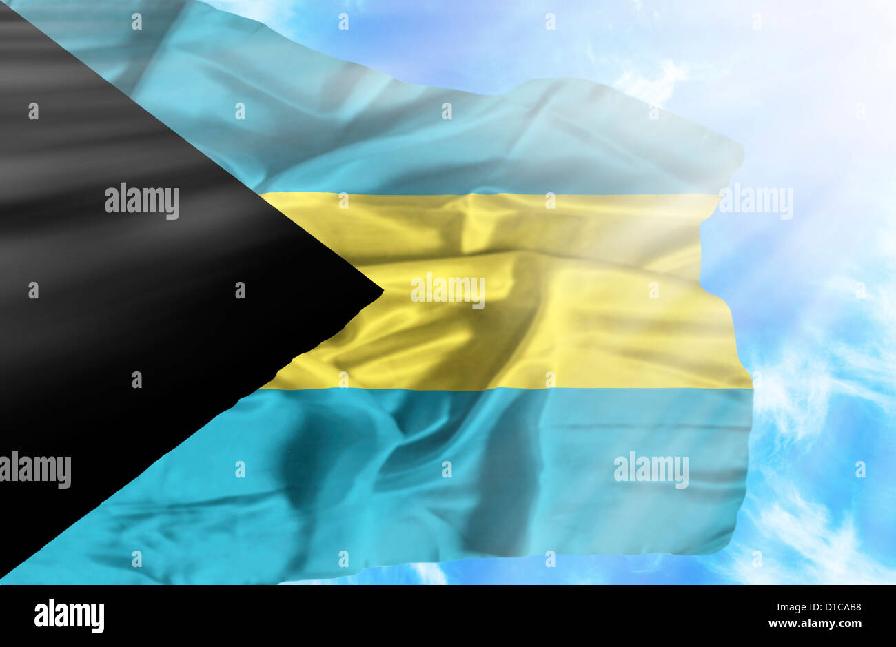 Bahamas waving flag against blue sky with sunrays Stock Photo - Alamy