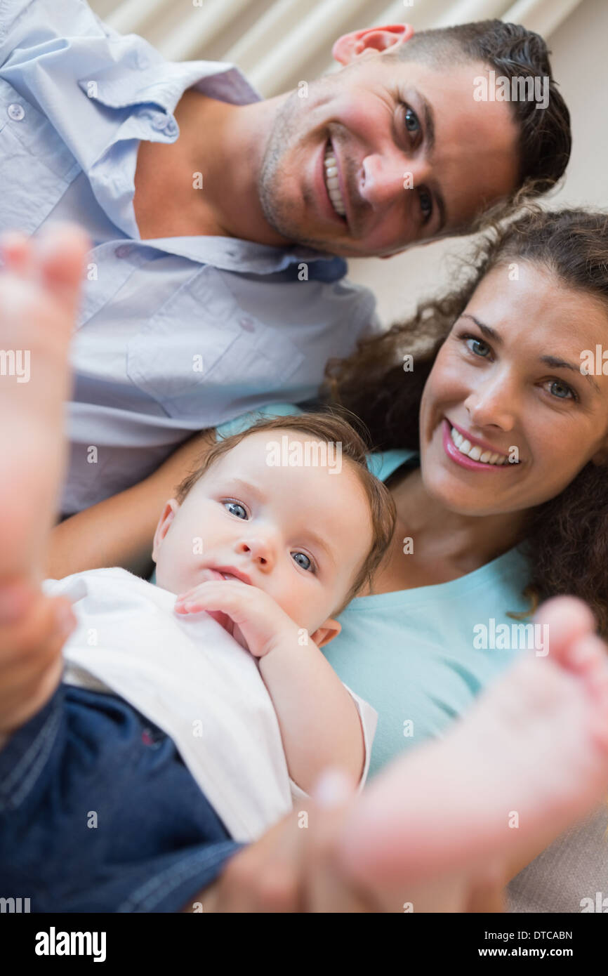 Happy parents with baby boy Stock Photo - Alamy