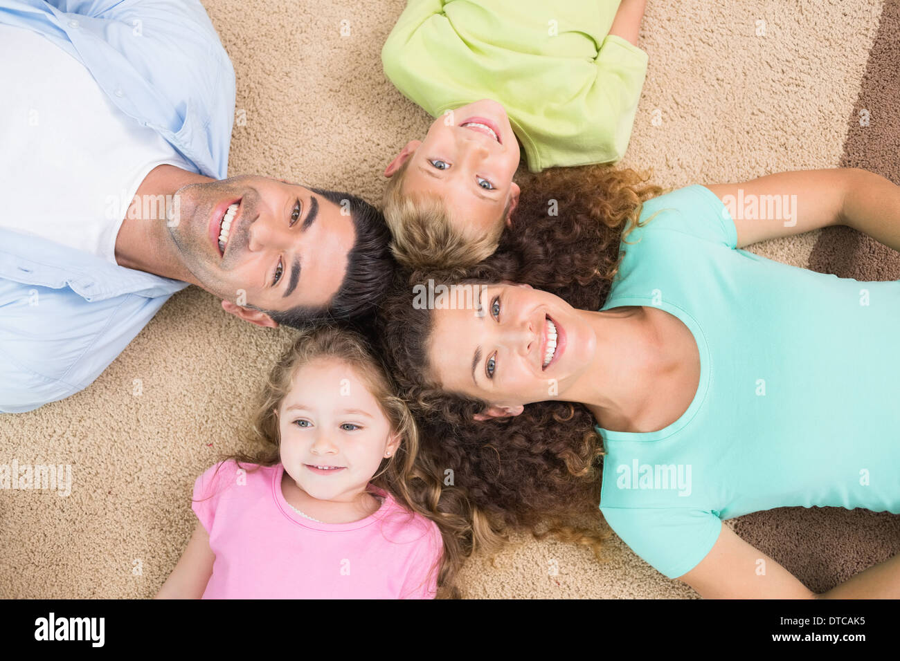 Family posing circle hi-res stock photography and images - Alamy