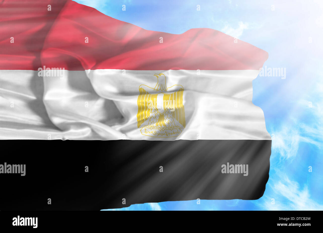 Egypt waving flag against blue sky with sunrays Stock Photo - Alamy