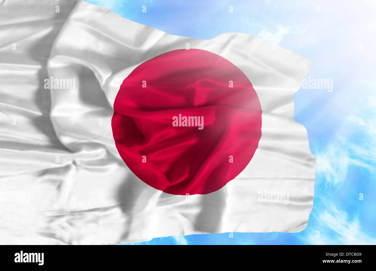 Japan waving flag against blue sky with sunrays Stock Photo - Alamy
