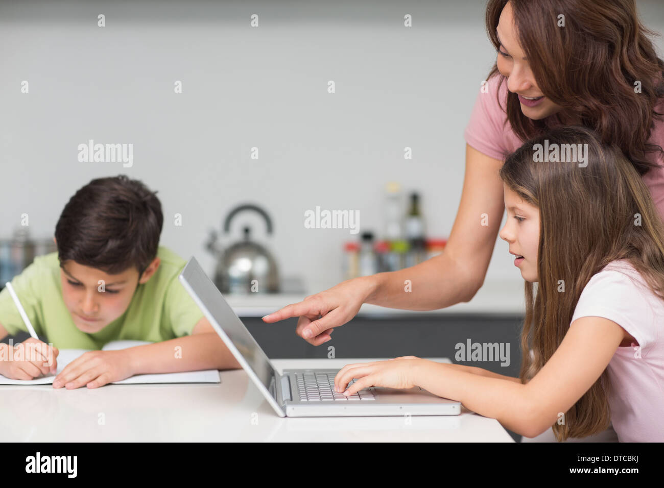 Child using laptop writing hi-res stock photography and images - Alamy
