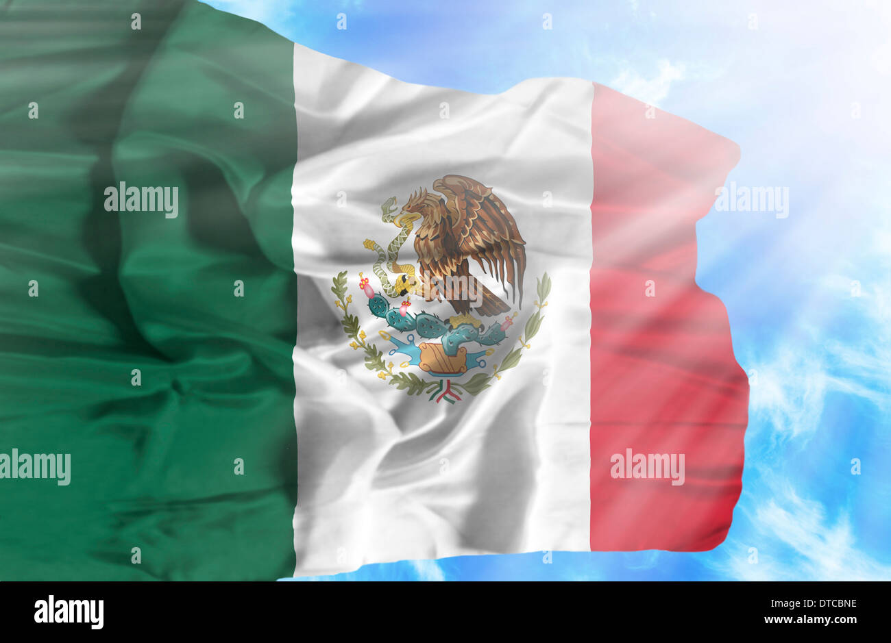 Mexico waving flag against blue sky with sunrays Stock Photo - Alamy
