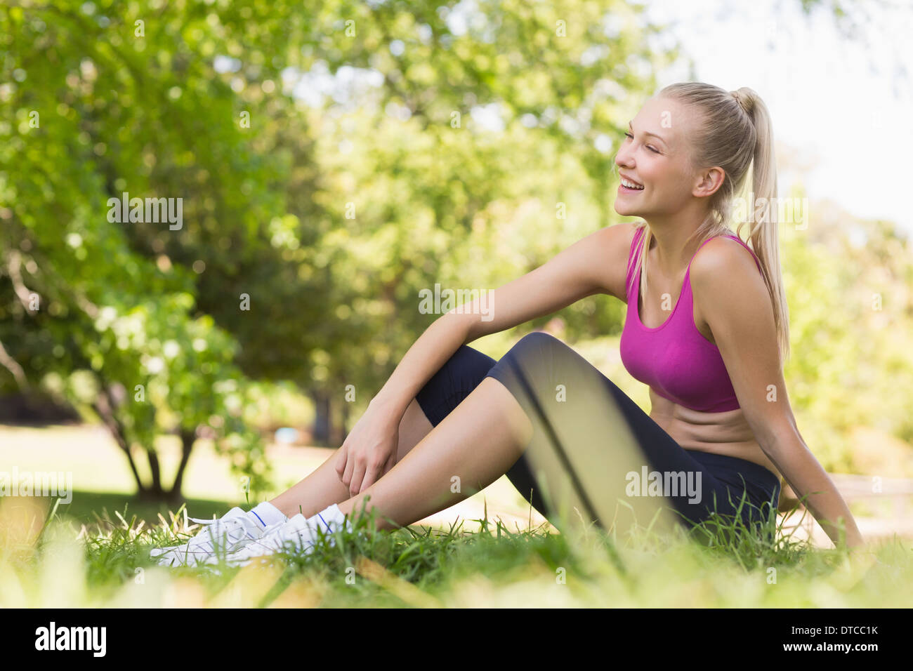 Full length of healthy and beautiful woman in park Stock Photo - Alamy
