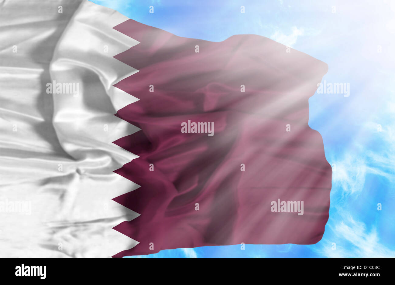 Qatar waving flag against blue sky with sunrays Stock Photo - Alamy
