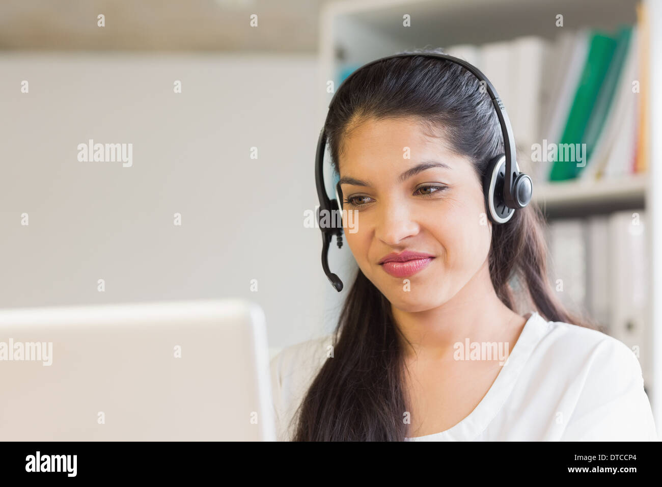 customer service operator wearing headset Stock Photo - Alamy