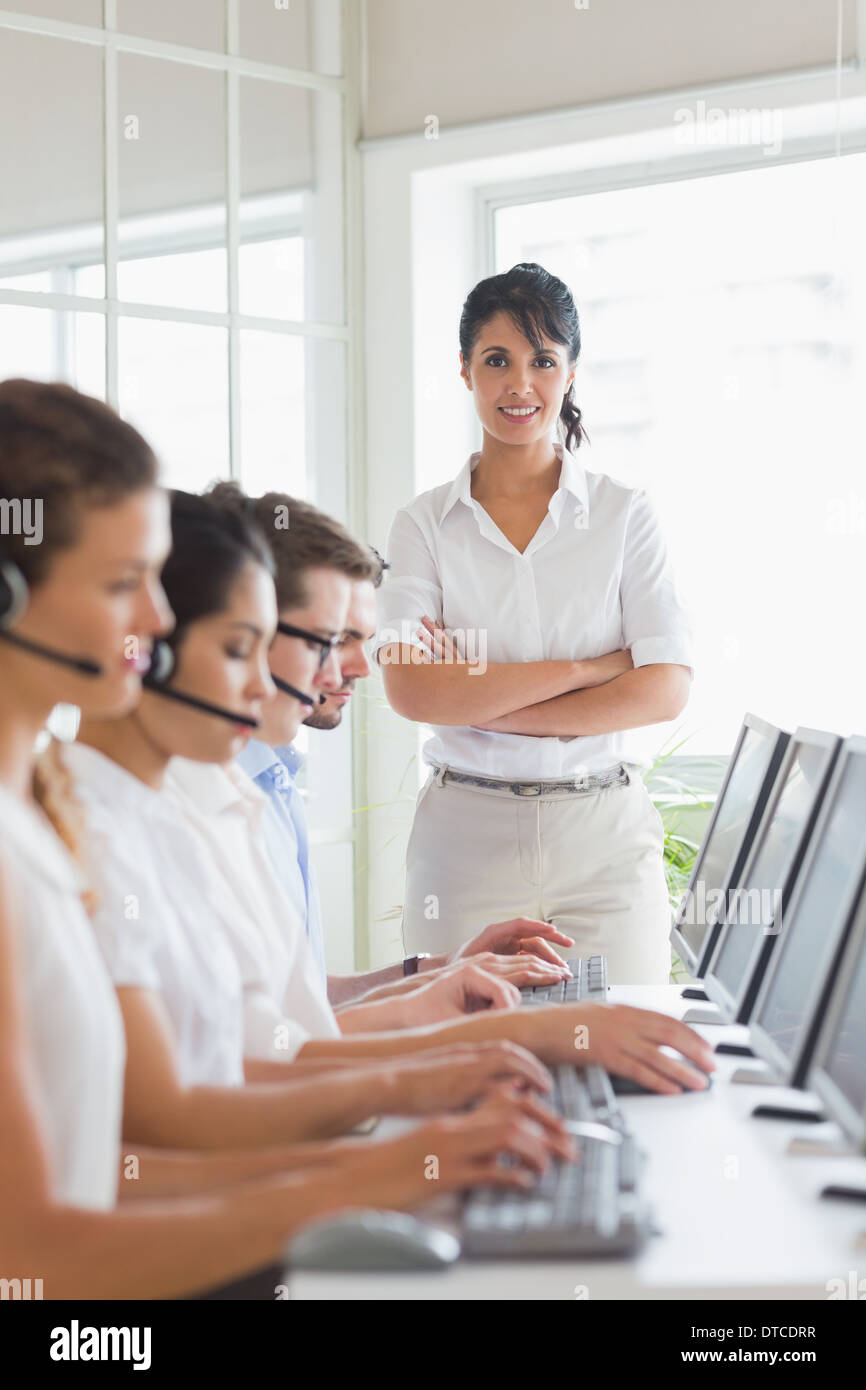 Female manager working in a call center Stock Photo - Alamy
